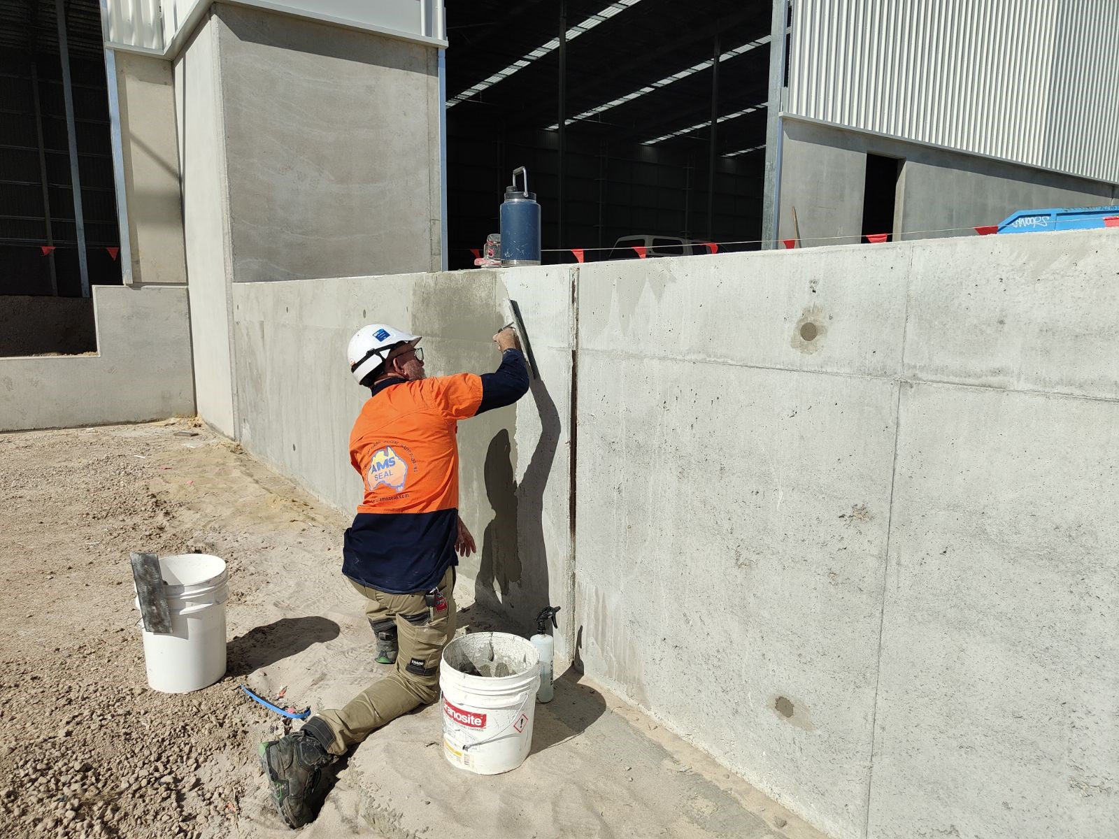 Skim Coating the Honeycombing of Concrete Panels | AMS Seal